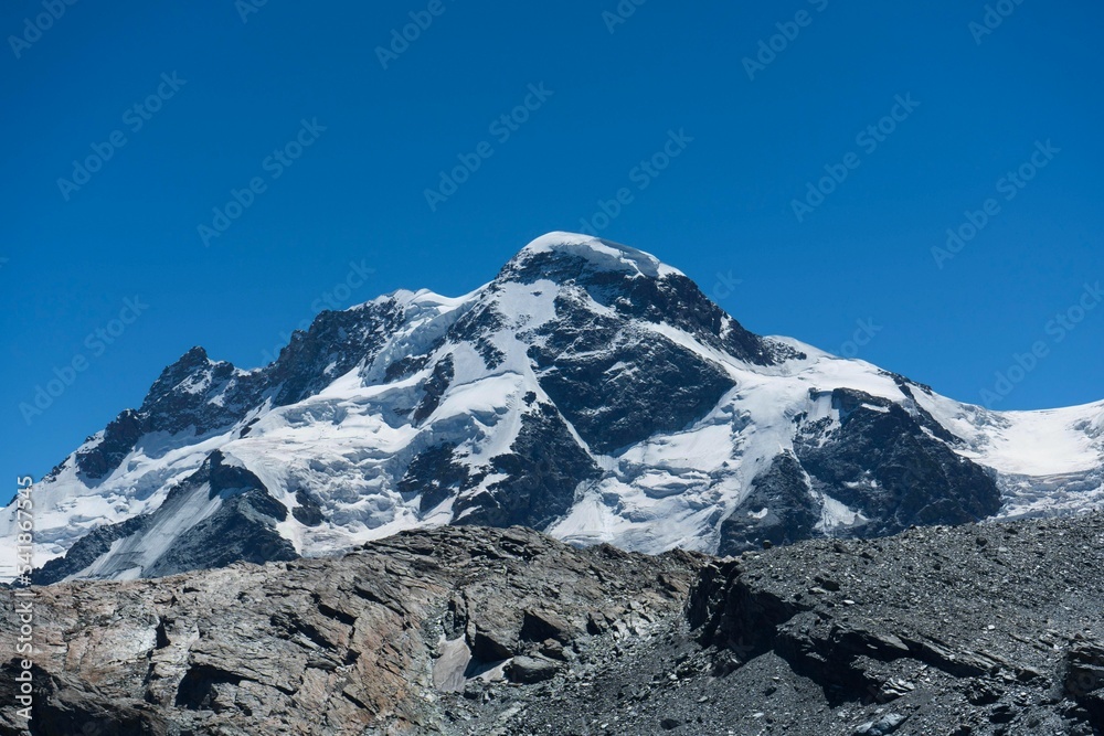 View of the snowy peaks of Breithorn mountain range from Hoernlihuette ...