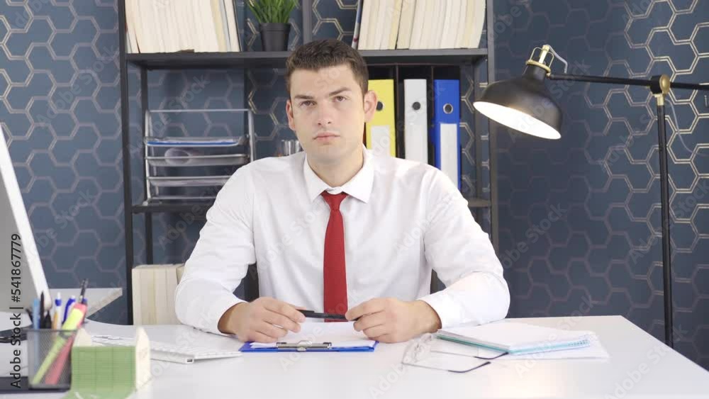 Office worker looking at camera. Office worker looking at camera. Stock ...