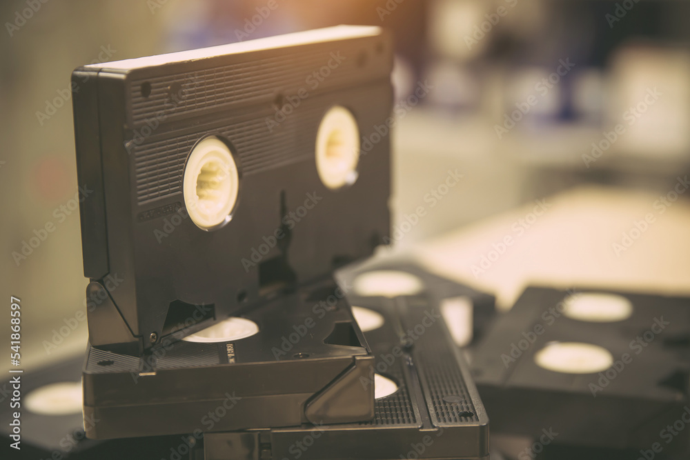 Pile of video cassette tape VHS on video playback stack concept of old ...