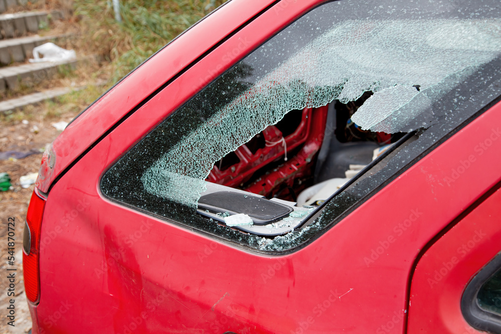 Car with broken windows. A criminal incident. Broken glass window car ...