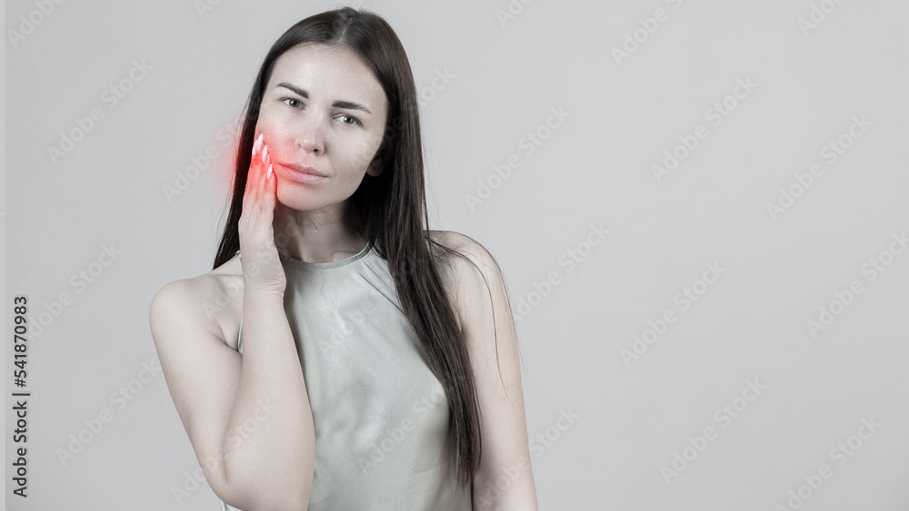 Asian beautiful woman feel terrible toothache Stock 写真 | Adobe Stock