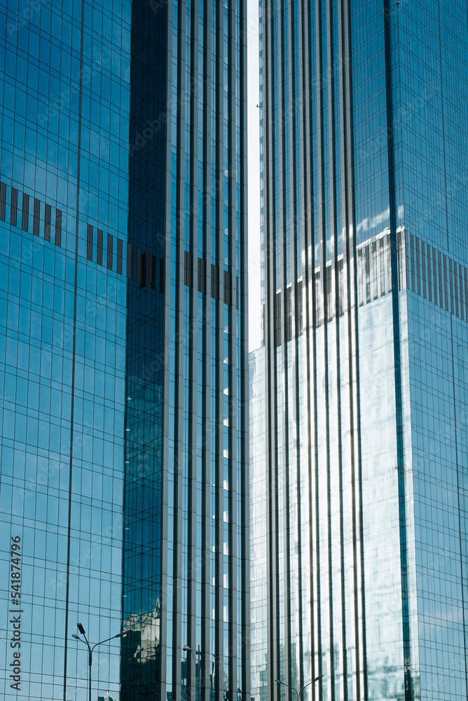 Skyscrapers with blue glass windows, exterior. Modern tall buildings ...