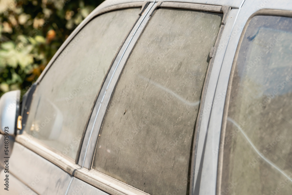 Dirty windows of a car parked for a long time in the open air Stock ...
