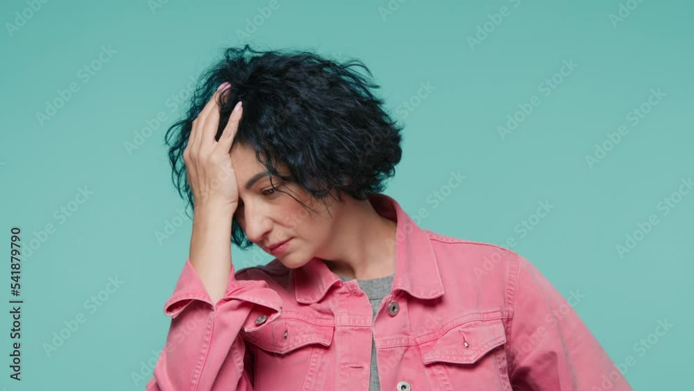 Upset Worried Curly Hair Woman Slapping Hand On Face And Expressing