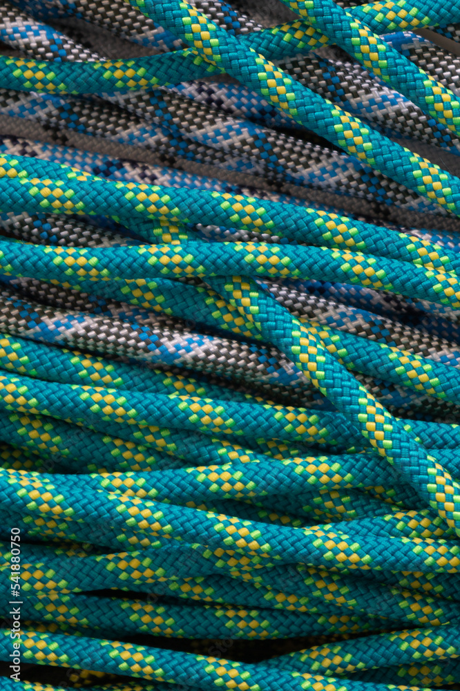 Multicoloured rope for climbing and mountaineering as a pattern ...
