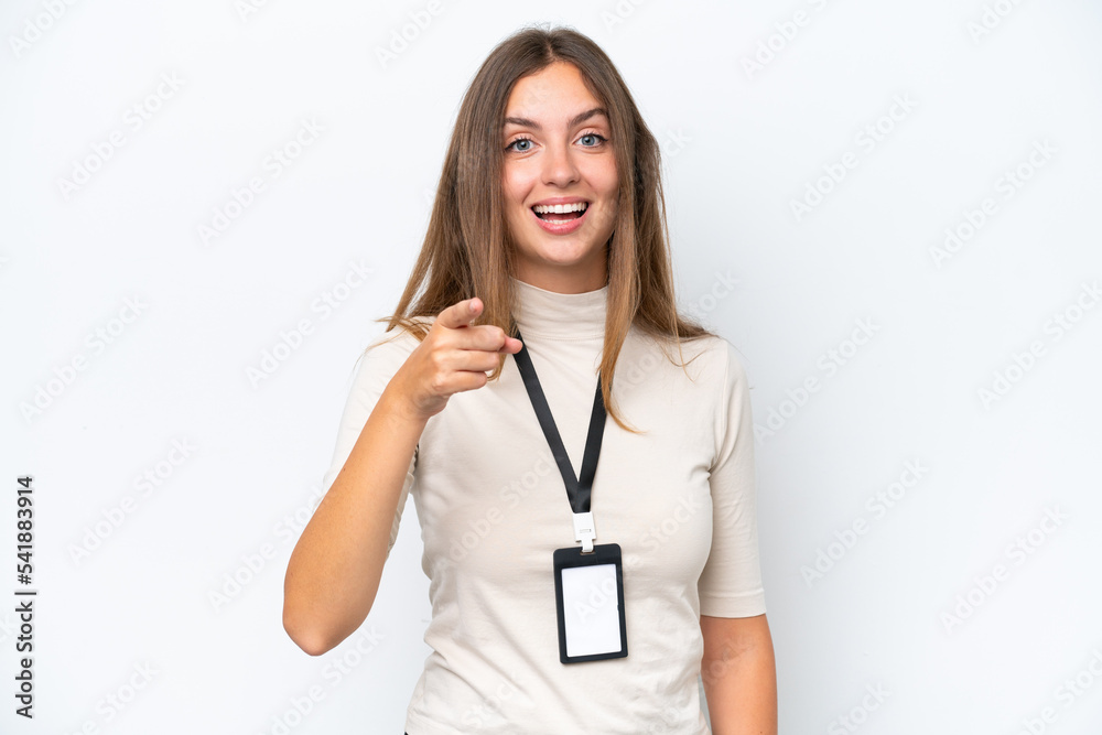Young pretty woman with ID card isolated on white background surprised ...