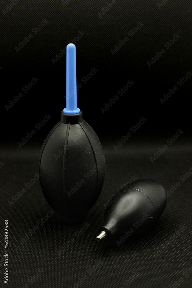 Hand air blower used to Camera Lens from dusk, isolated on black ...