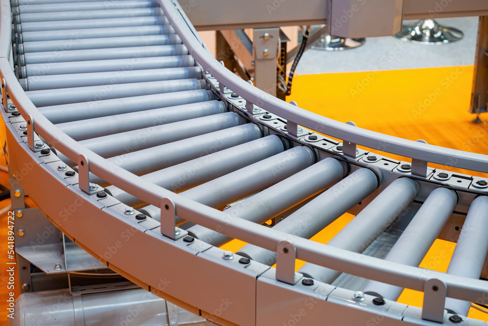 Conveyor for warehouse enterprise. Empty conveyor. Production line with ...