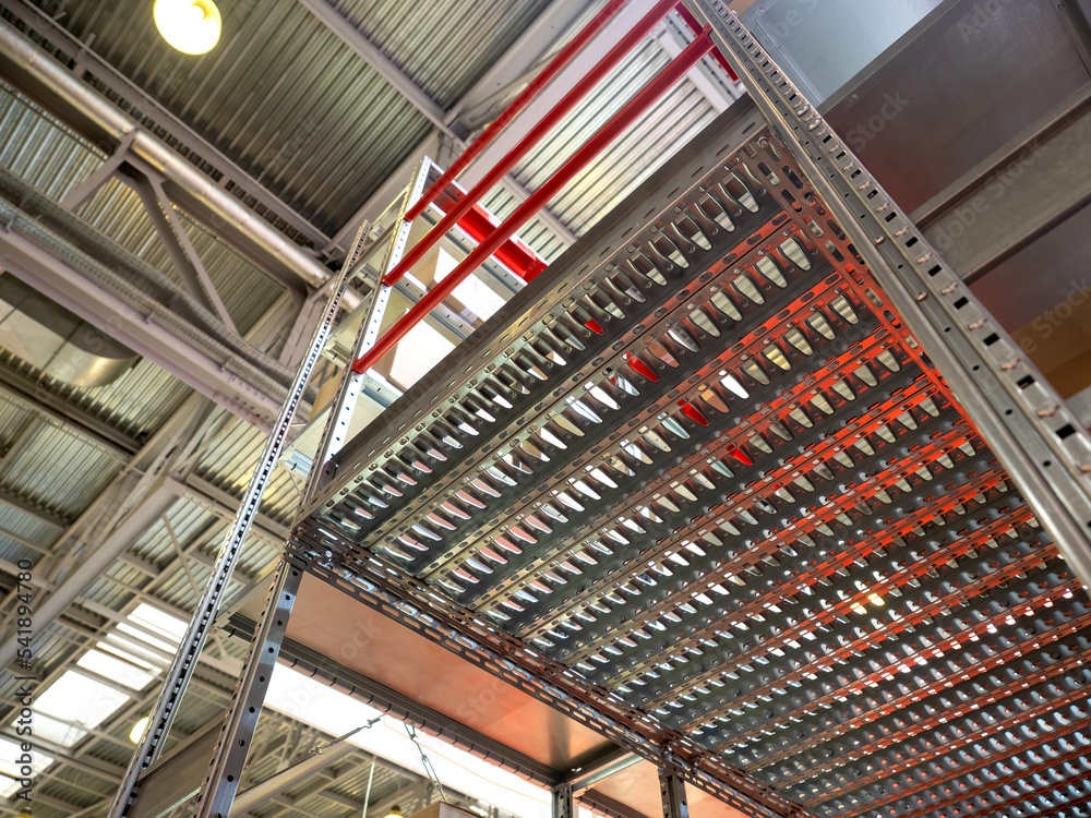 Warehouse mezzanine. Mezzanine inside storage building. Warehouse ...