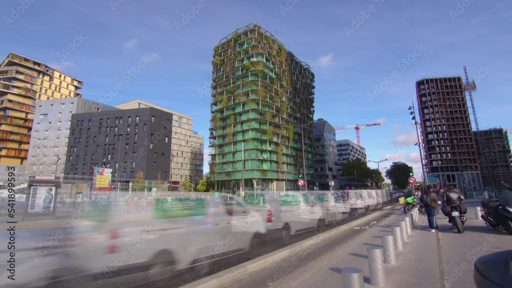 Timelapse of Paris business district and ecological skyscraper with ...