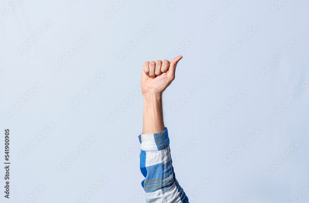 Hand gesturing the letter A in sign language on isolated background ...
