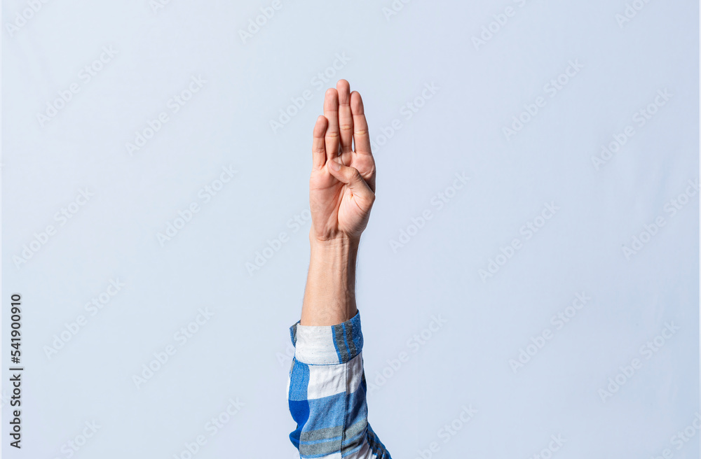 Hand gesturing the letter B in sign language on isolated background ...