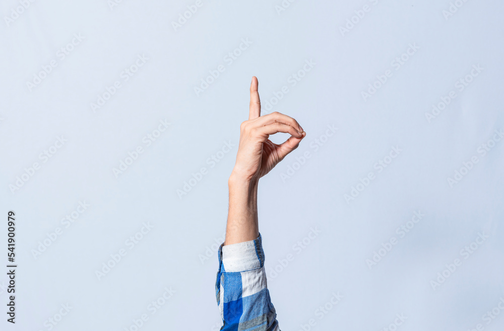 Hand gesturing the letter D in sign language on isolated background ...