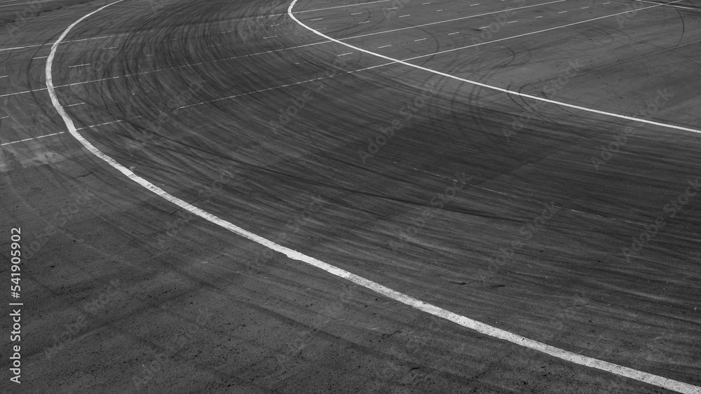 Background with tire marks on road track, Car track asphalt pavement ...