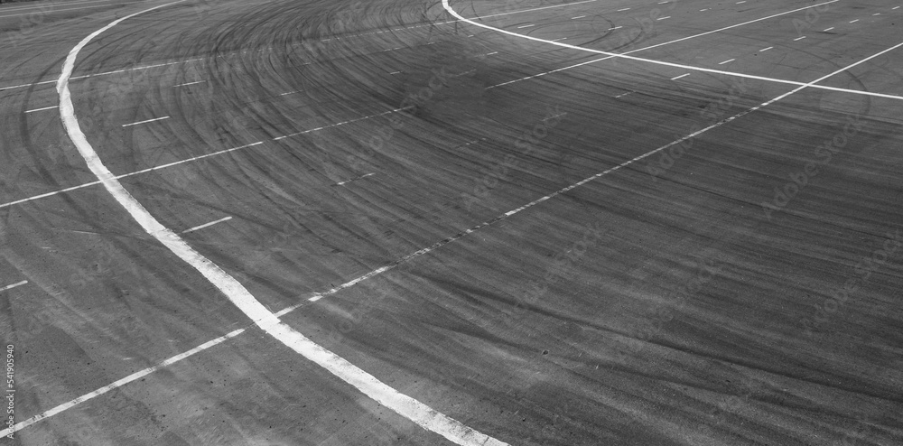 Background with tire marks on road track, Car track asphalt pavement ...