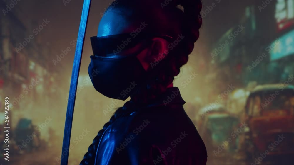 Cyberpunk ninja girl in a mask and with a katana. Beautiful samurai ...