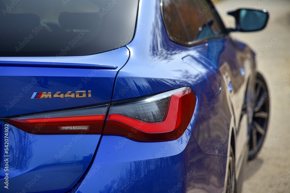 BMW M440i xDrive Gran Coupe. Rear light and type designation on the ...