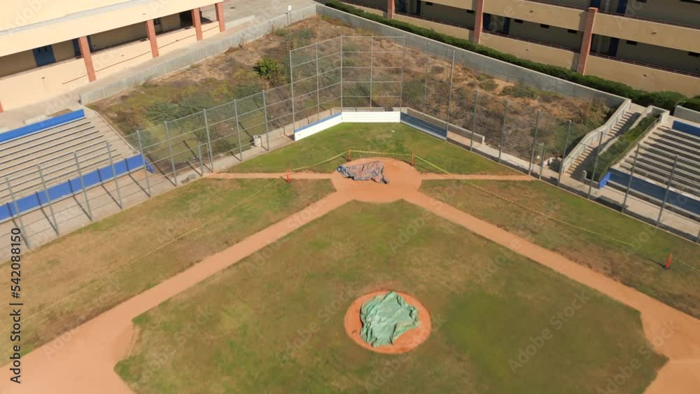 This video shows an aerial, overhead view of an empty baseball field ...