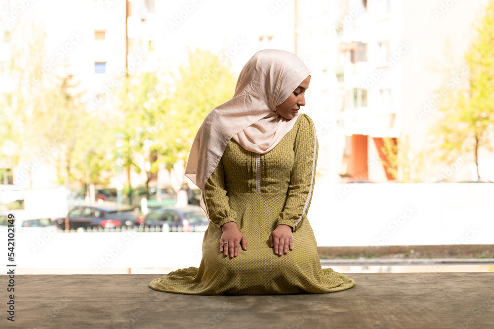 Muslim Woman Praying at the Mosque Stock Photo | Adobe Stock