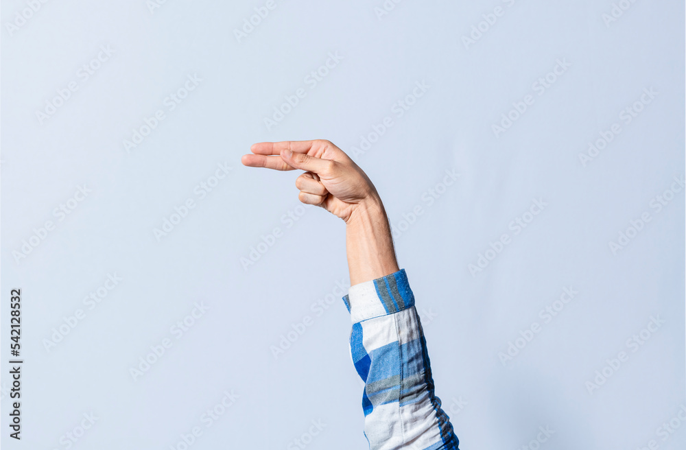 Hand gesturing the letter H in sign language on an isolated background ...