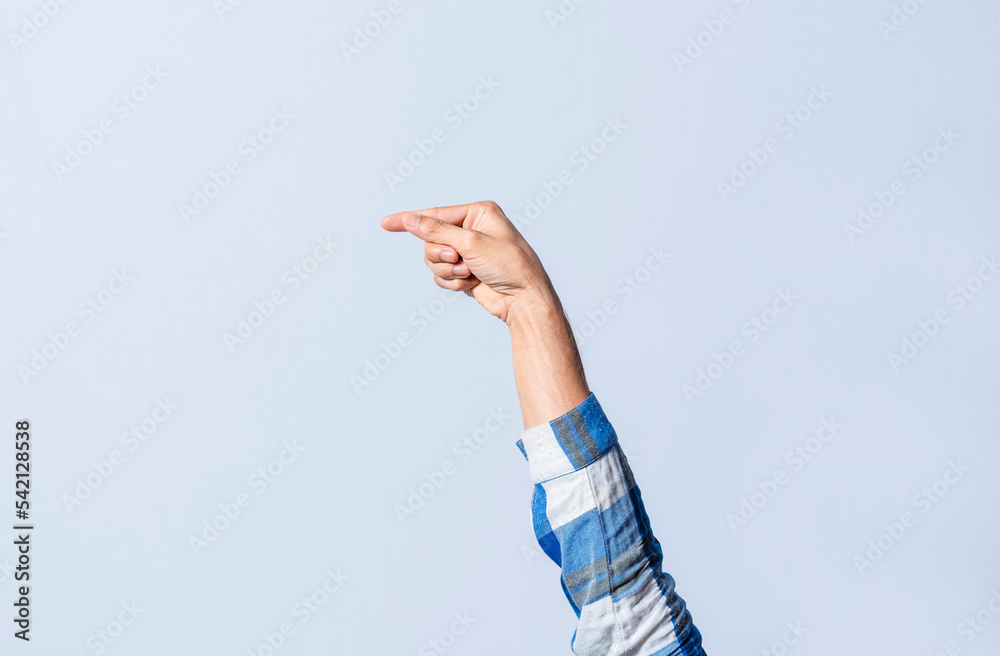 Hand gesturing the letter G in sign language on an isolated background ...