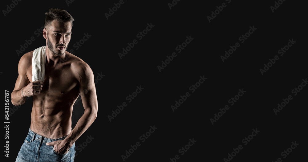 studio shot of muscular man. six pack and torso. banner with man having ...