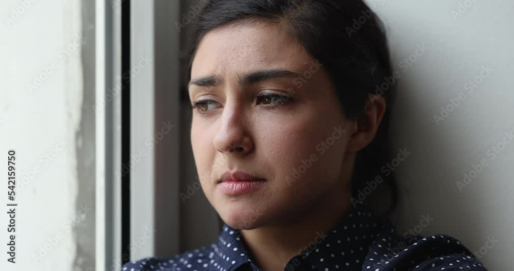 Close up unhappy young 25s Indian woman feels depressed, suffers from ...
