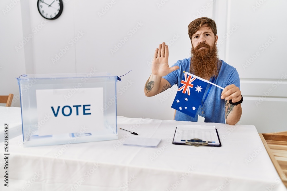 Caucasian man with long beard at political campaign election holding ...