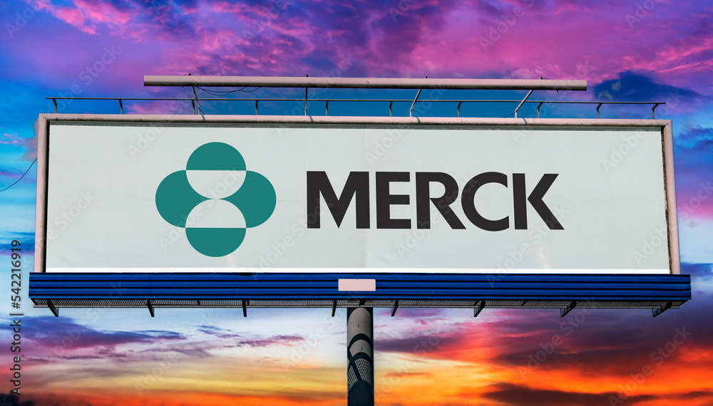 Advertisement billboard displaying logo of Merck Stock Photo | Adobe Stock