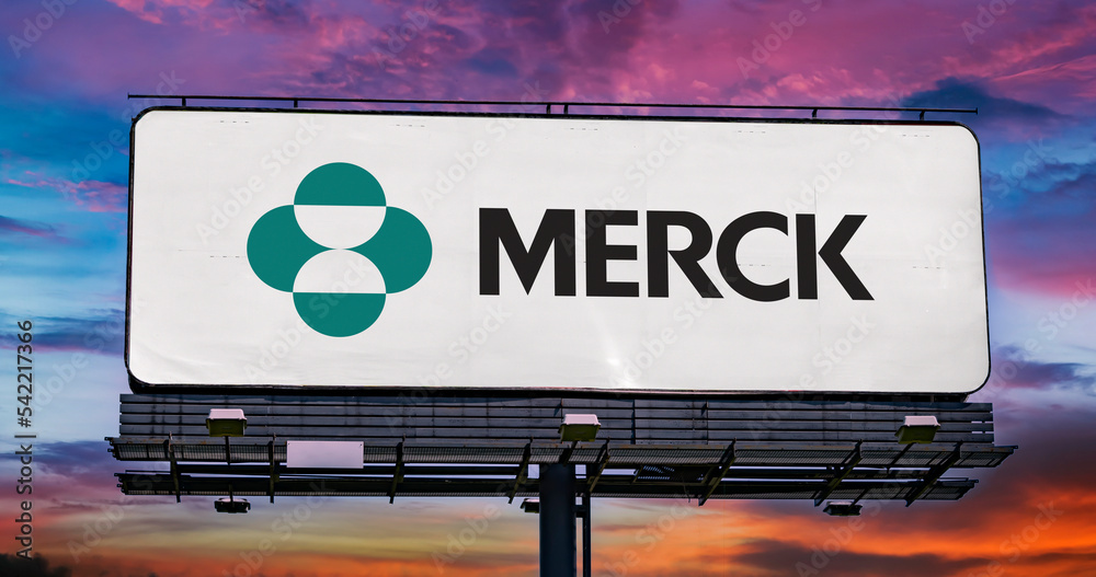 Advertisement billboard displaying logo of Merck Stock Photo | Adobe Stock