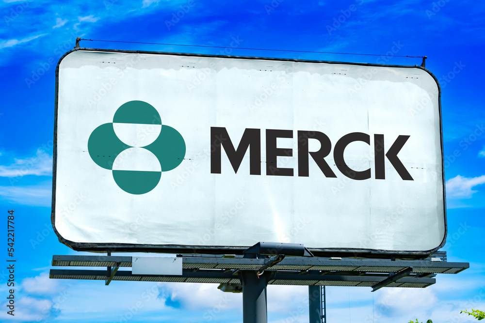 Advertisement billboard displaying logo of Merck Stock Photo | Adobe Stock
