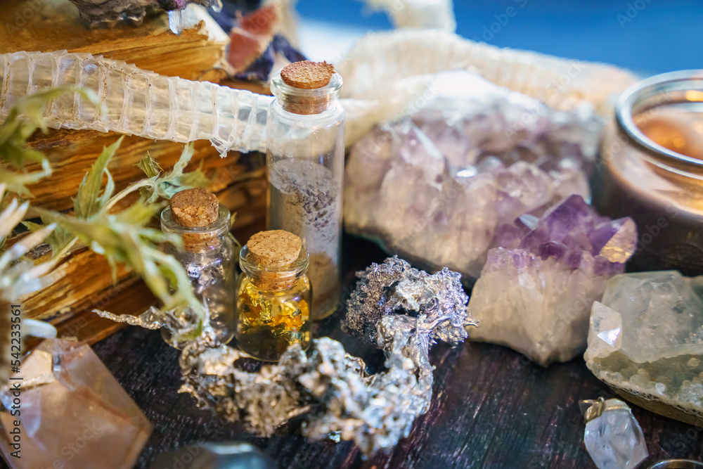 A very soft focus on a selection of minerals and traditional magical ...