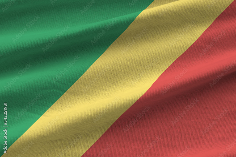 Congo flag with big folds waving close up under the studio light ...