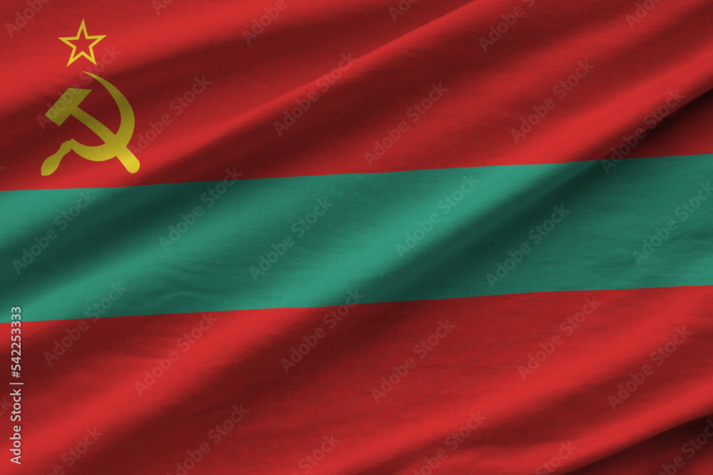 Transnistria flag with big folds waving close up under the studio light ...