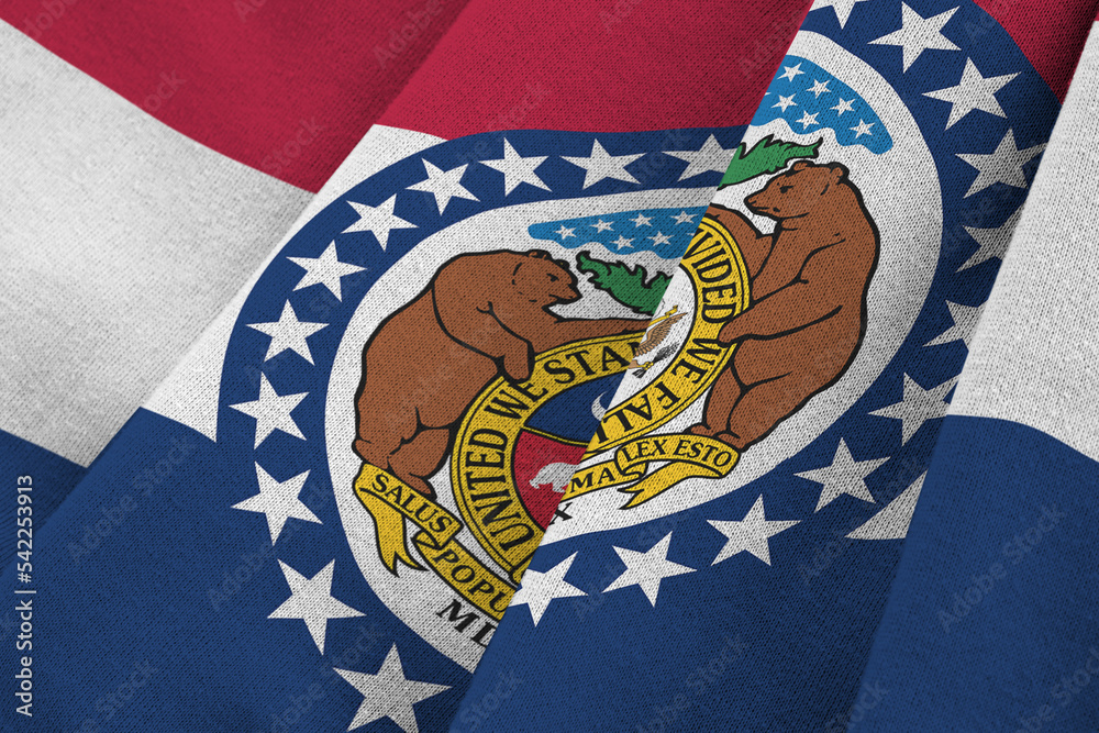 Missouri US state flag with big folds waving close up under the studio ...