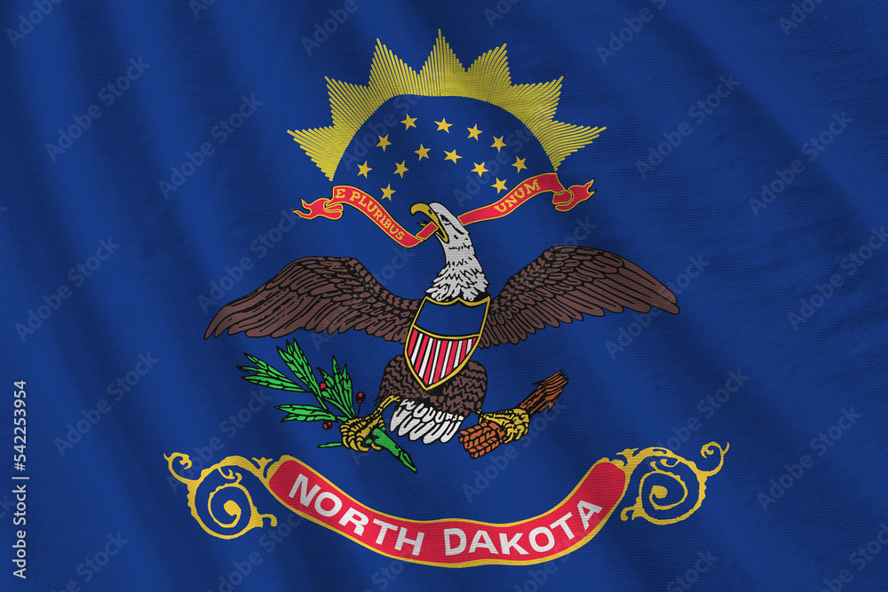 North Dakota US state flag with big folds waving close up under the ...