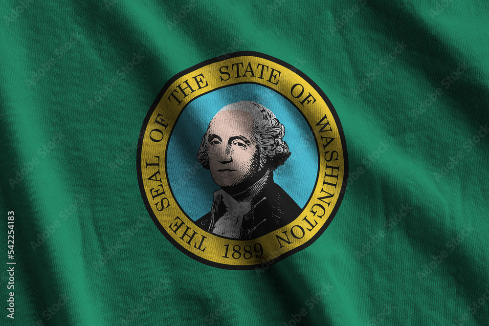 Washington US state flag with big folds waving close up under the ...