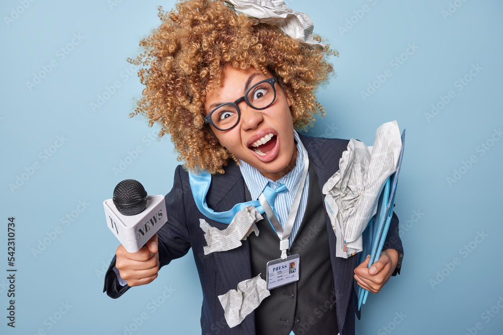 Funny female correspondent tries to capture news as it happens holds ...