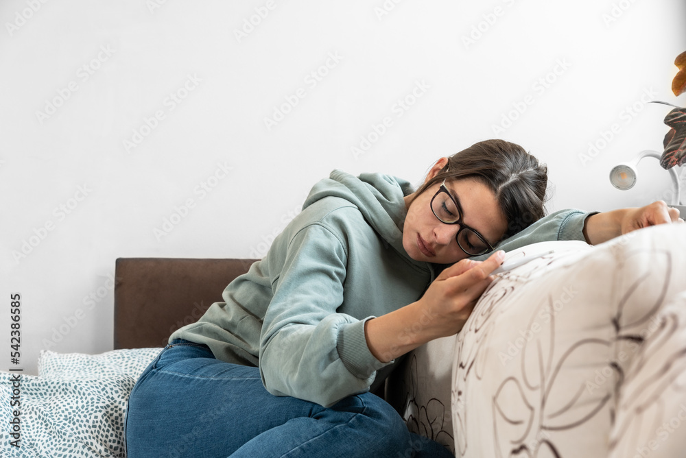 Young frustrated sick woman ill from common cold and flu virus ...