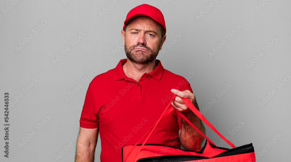 middle age man feeling sad and whiney with an unhappy look and crying ...