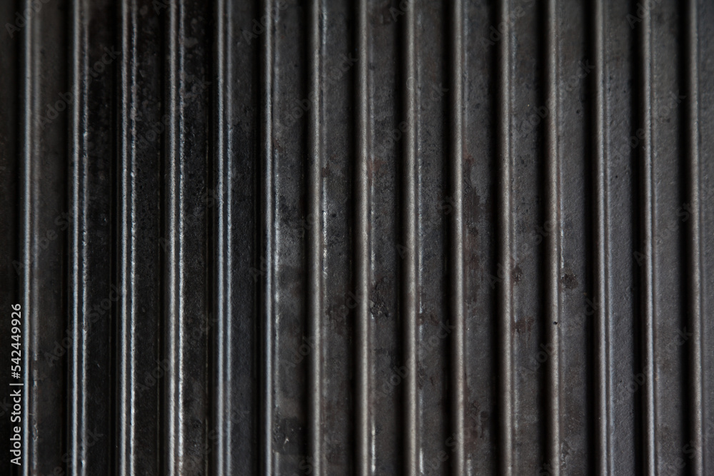 Texture of empty black cast heavy iron grill pan, modern kitchen ...