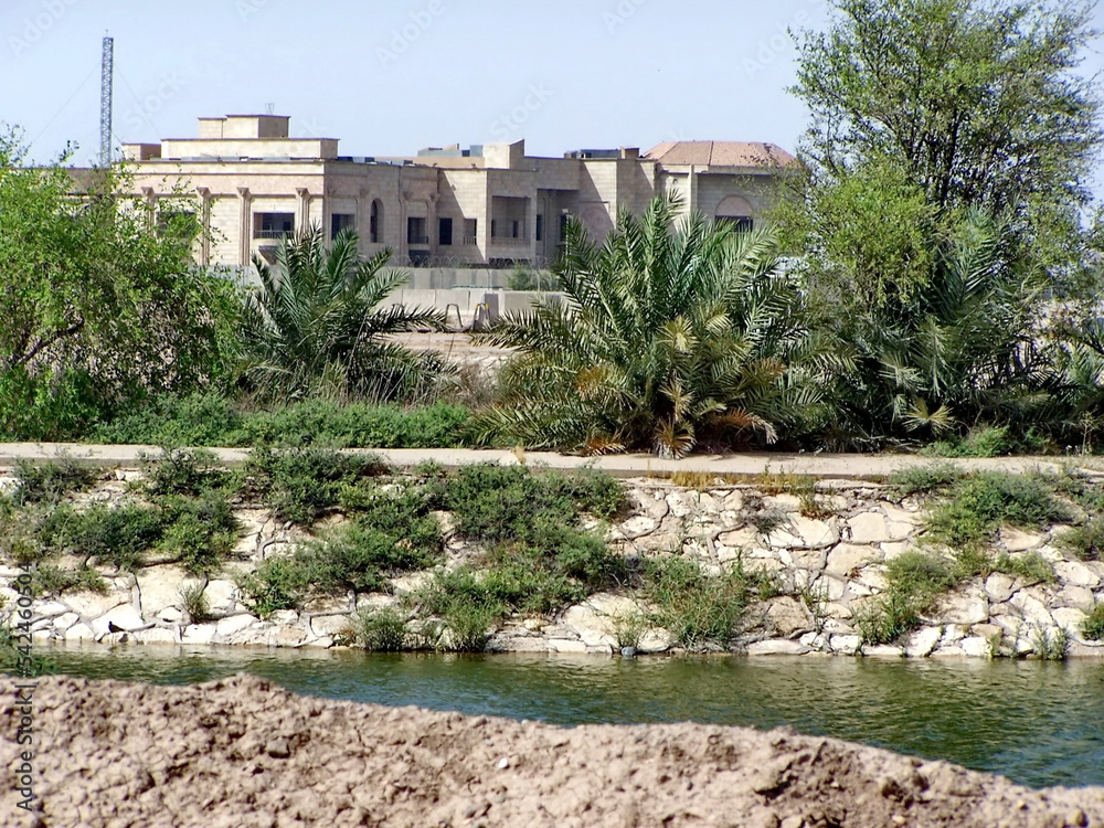 Sadaam-era building built along a canal draining into the Shatt al-Arab ...
