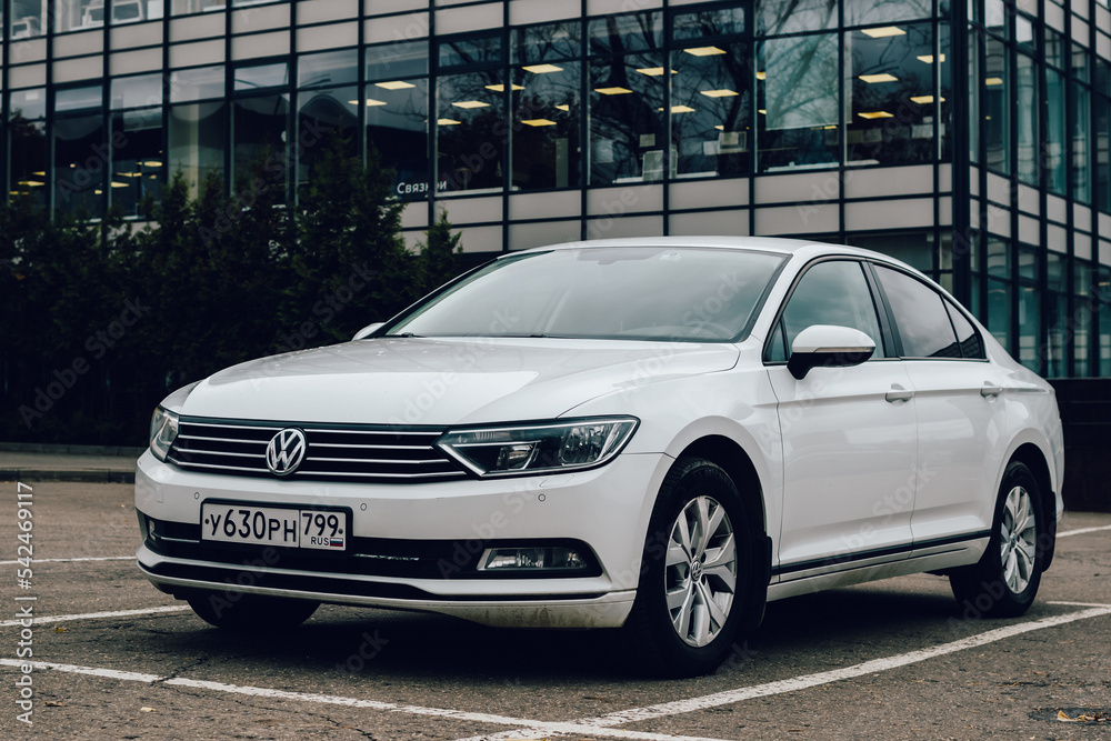 Foto de White car Volkswagen Passat B8 is parked on the parking in ...