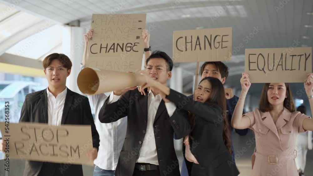 Group of activists with banners protesting to democracy and equality ...
