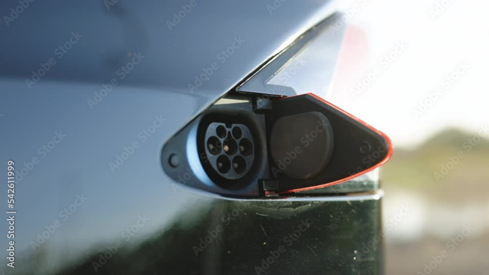 Type 2 plug port on electric vehicle. Fast charging socket type 2 ...