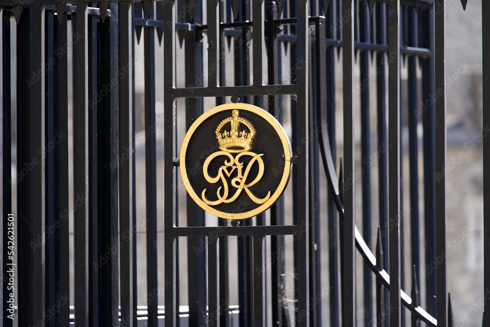 Black iron gate with golden emblem at famous Tower Of London at City of ...