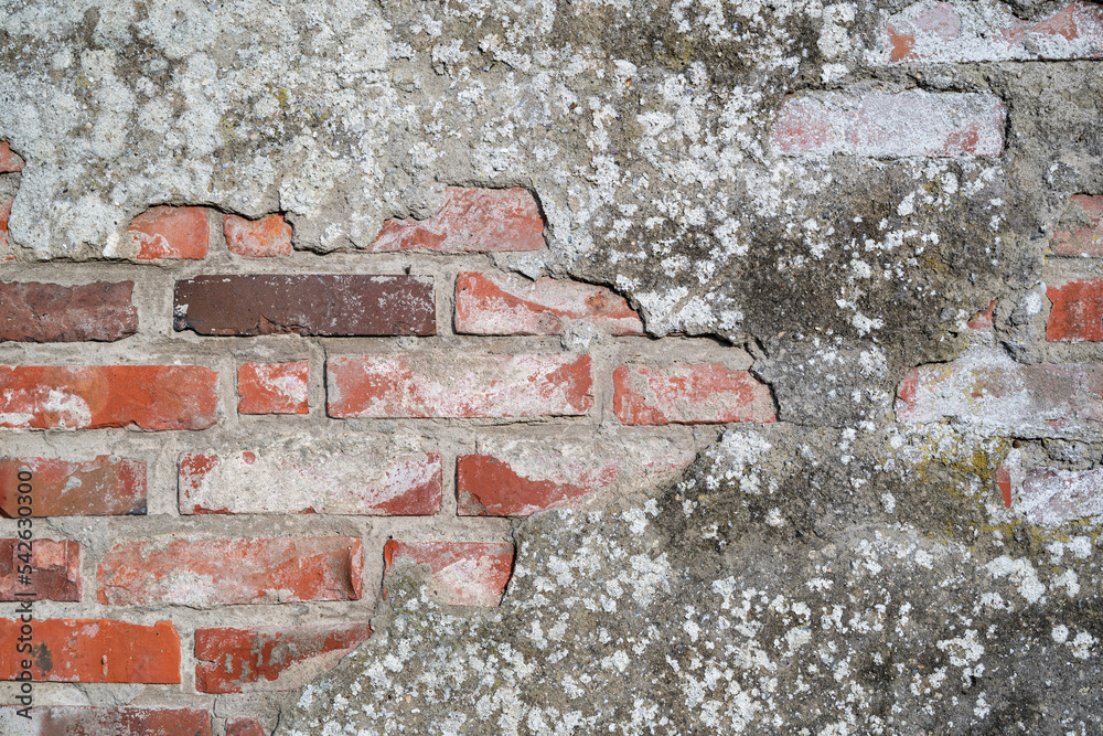 brick wall with crumbling plaster for background use Stock Photo ...