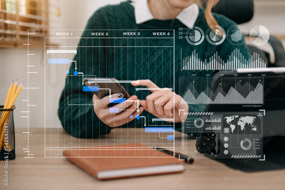 Businessman hand Project manager working and update tasks and Gantt ...