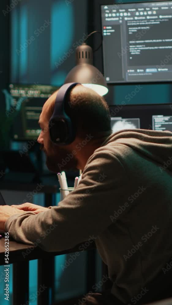 Vertical video: Silly web developer playing air drums and listening to ...