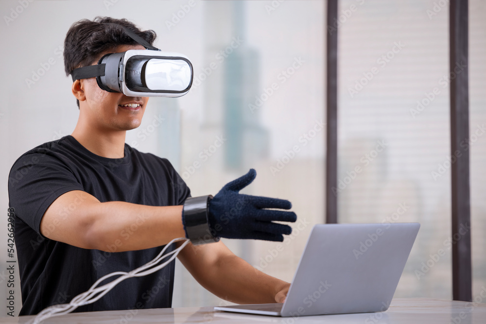 Man Wearing Vr Headset And Haptic Glove Interacting With Virtual Objectperson In The Metaverse 2464